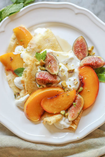cornmeal crepes with figs, peaches and honey